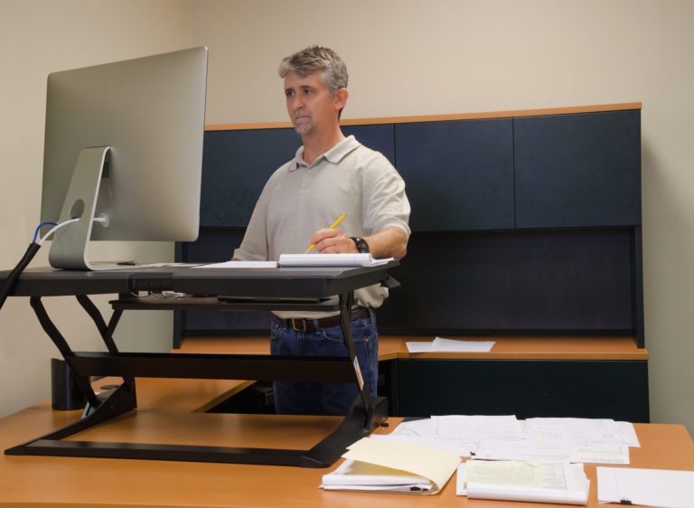 Using a Standing Desk Correctly | Posture, benefits & stretches